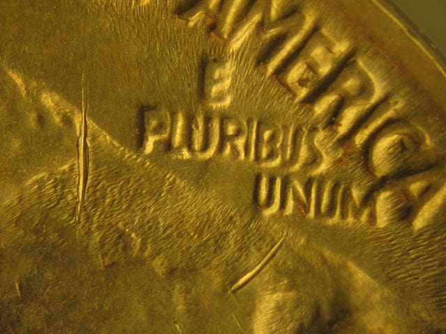 Scratches vary in severity on coins - Numismatic News